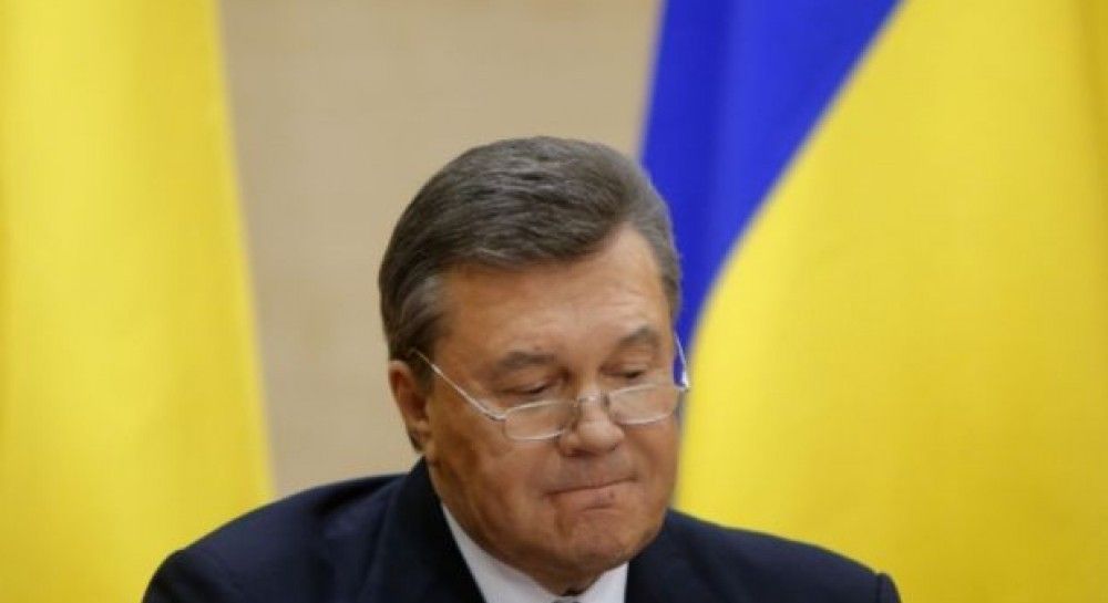 Yanukovych says he'll return to Ukraine as soon as possible
